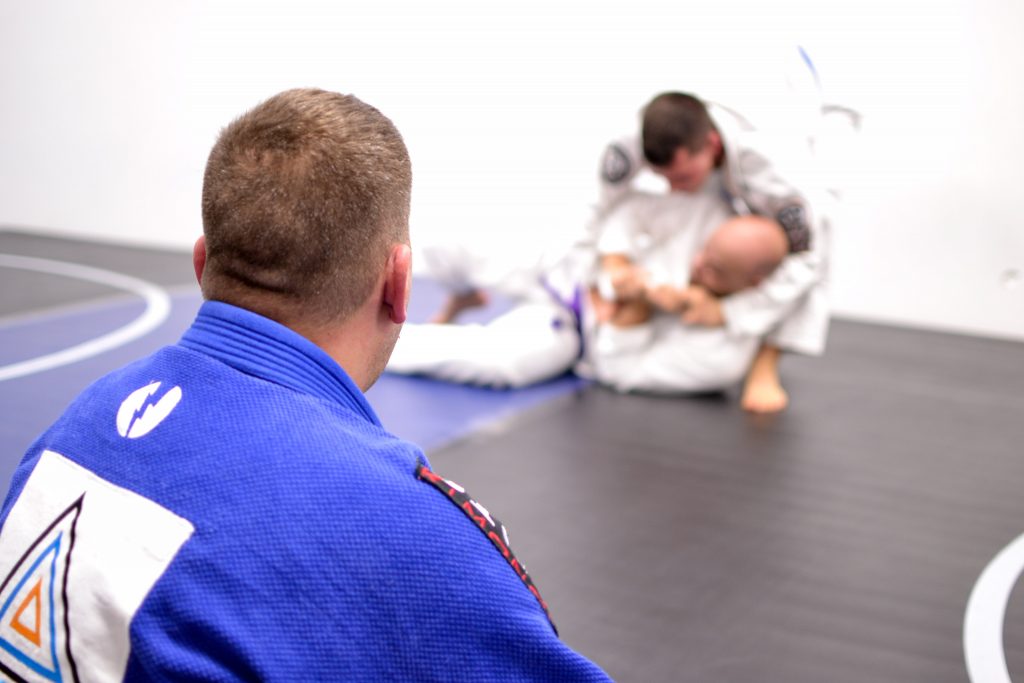 Rolling In BJJ: How to Improve Your Sparring - BJJ World