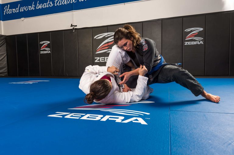 Rolling In BJJ: How to Improve Your Sparring - BJJ World
