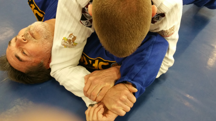 Learn Everything You Can Do With The Figure Four Grip In BJJ - BJJ World
